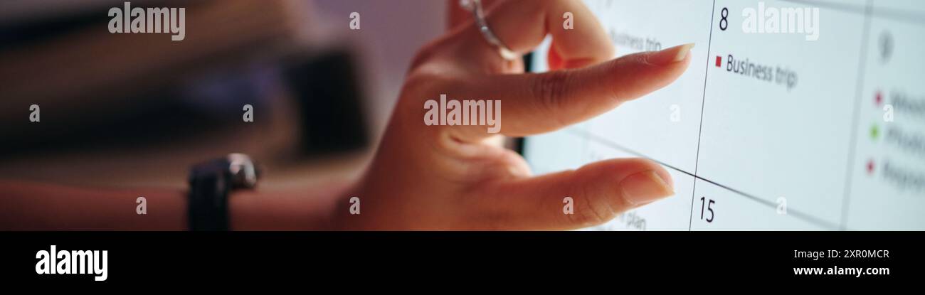 Pointing Finger at Calendar with Business Schedule Stock Photo - Alamy