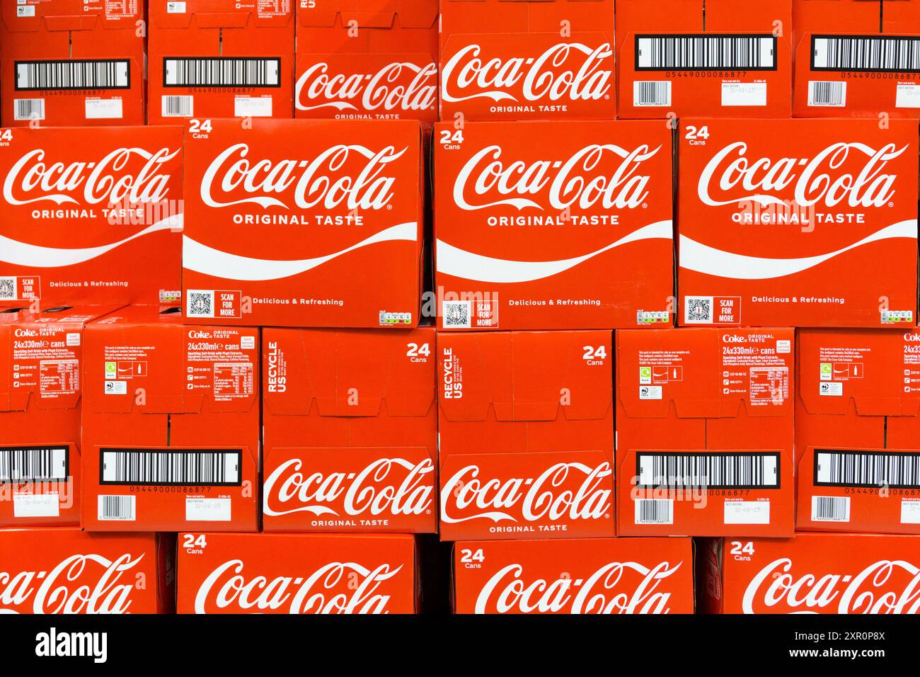 Boxes containing 24 cans of Coca-Cola for sale in a supermarket Stock ...