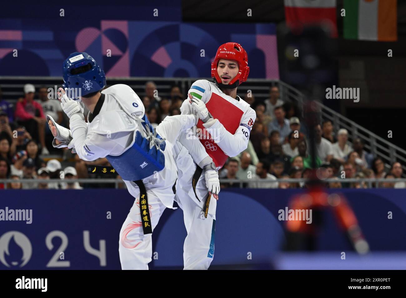 Yushuai Liang of China vs Ulugbek Rashitov of Uzbekistan, Taekwondo ...