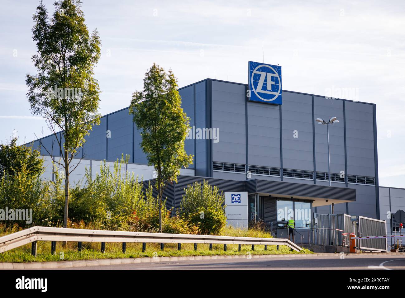 06 August 2024, Saarland, Saarbrücken: View of a factory entrance at ...