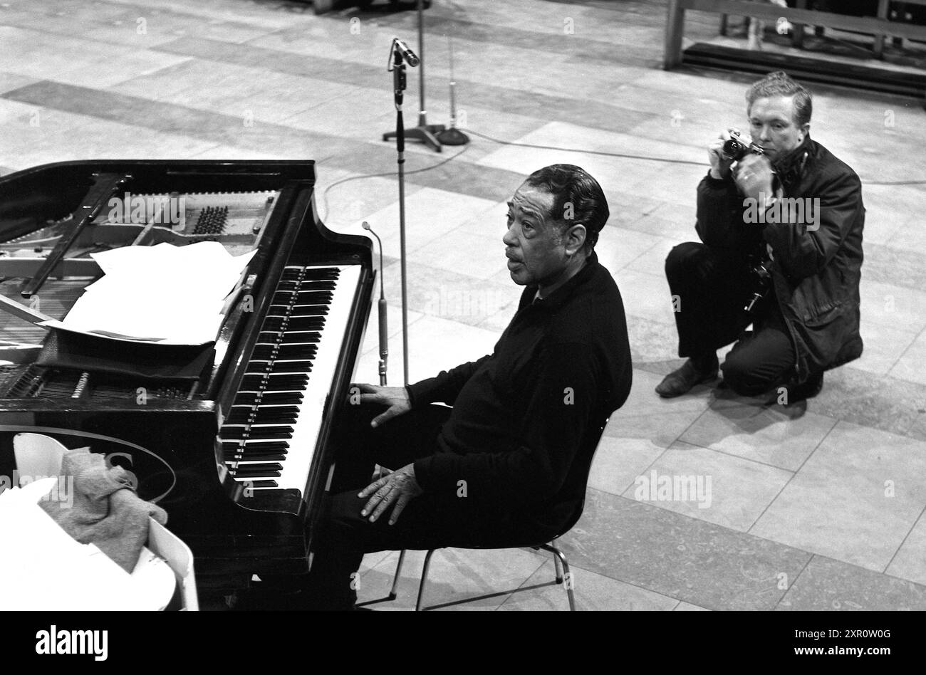 Duke Ellington rehearsing at a piano for a concert for ABC Television ...