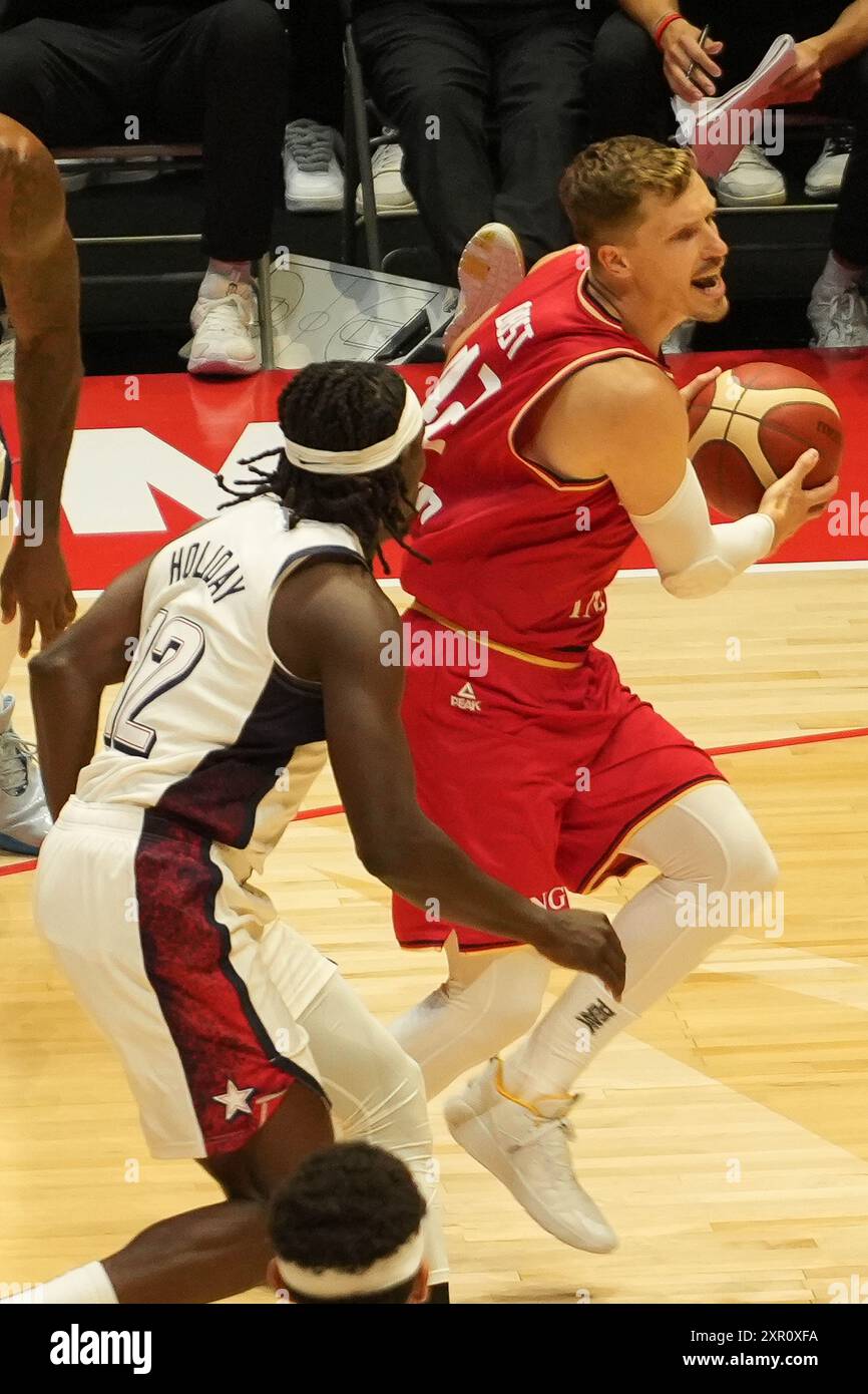 Andreas Obst OF Germany and Jrue Holiday of USA during the ...