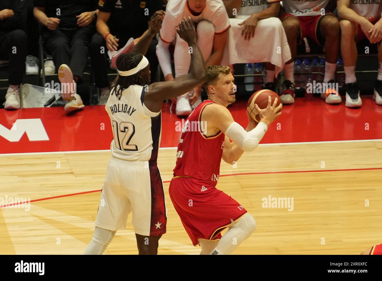 Andreas Obst OF Germany and Jrue Holiday of USA during the ...