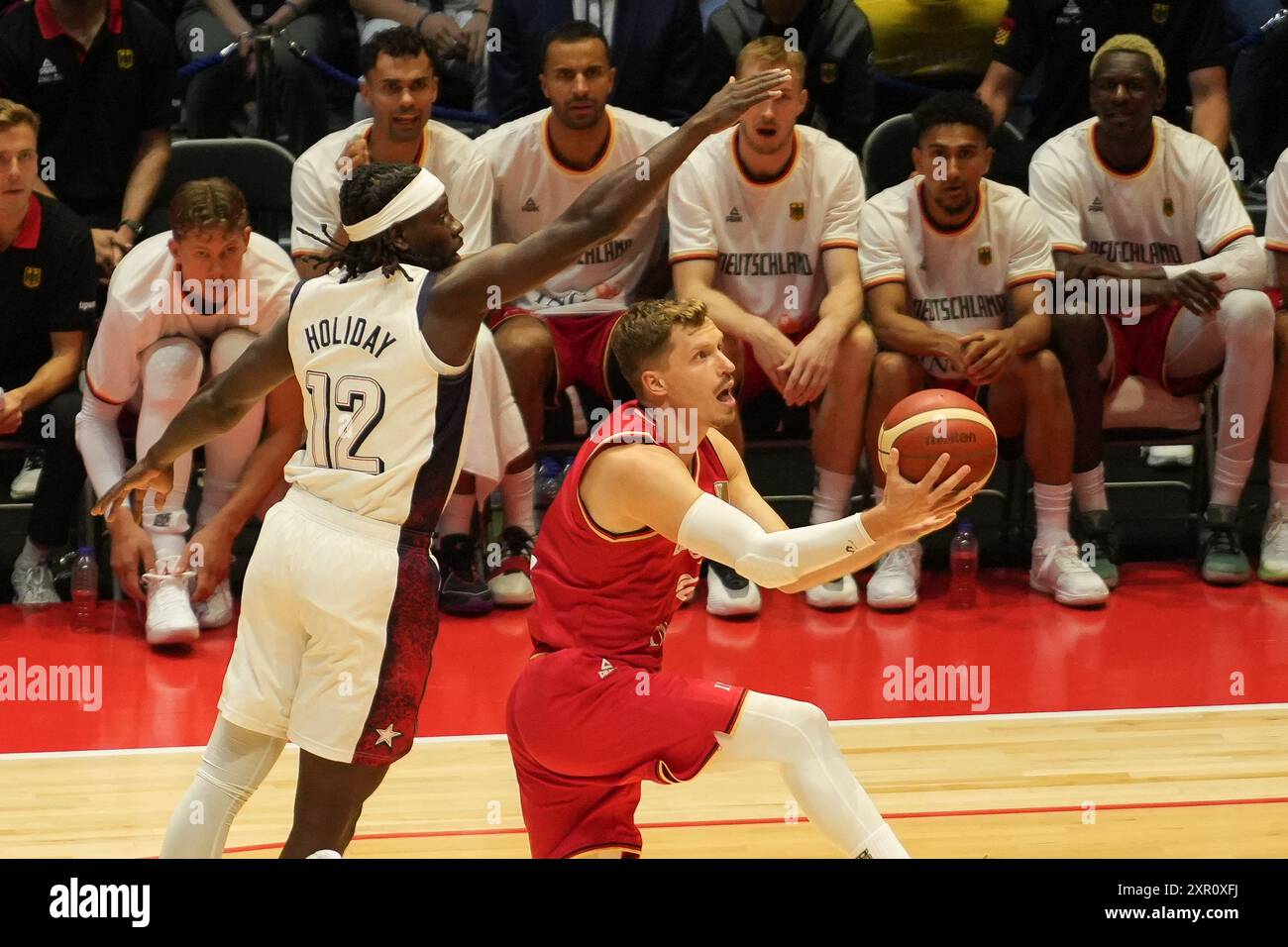 Andreas Obst OF Germany and Jrue Holiday of USA during the ...