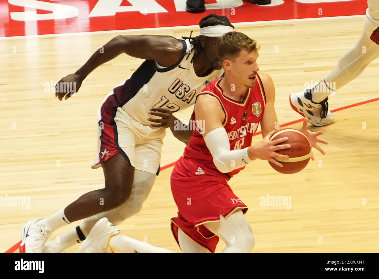 Andreas Obst of Germany and Jrue Holiday of USA during the ...