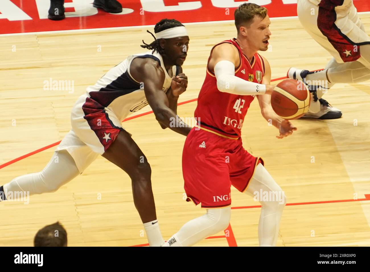 Andreas Obst of Germany and Jrue Holiday of USA during the ...