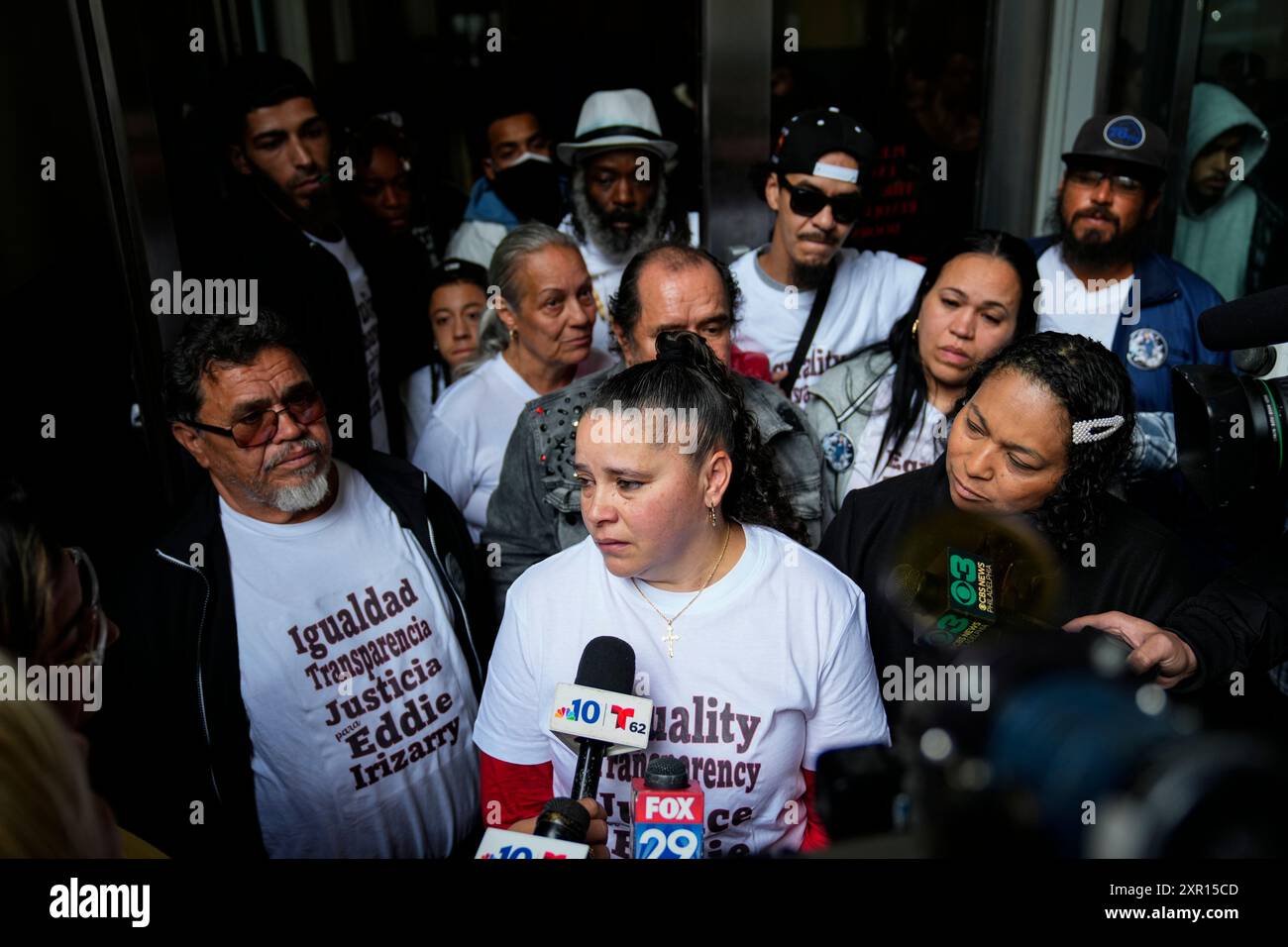 FILE - Eddie Irizarry's aunt, Ana Cintron, center, speaks with members ...
