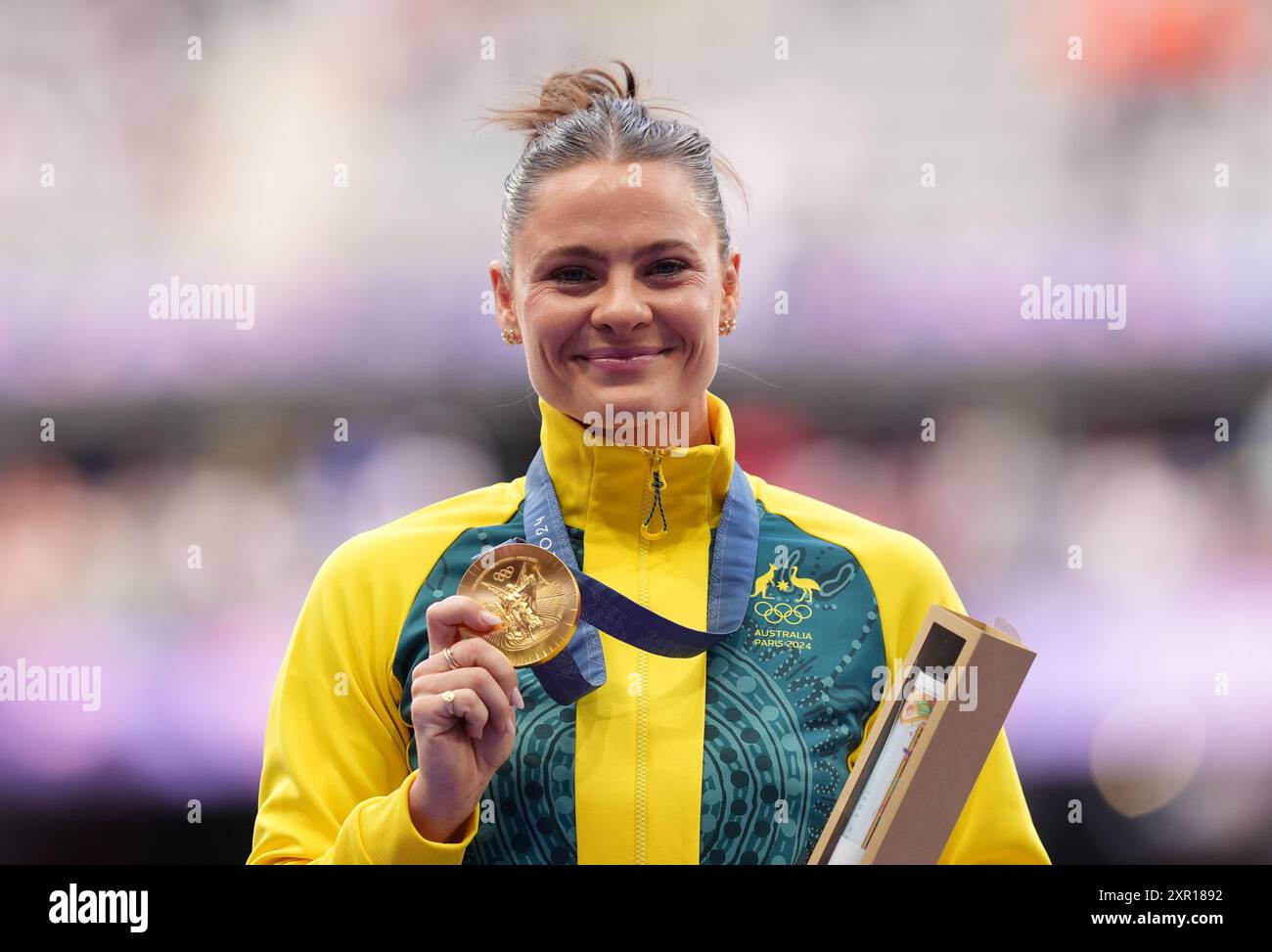 Australia's Nina Kennedy with the gold medal for the Women's Pole Vault ...
