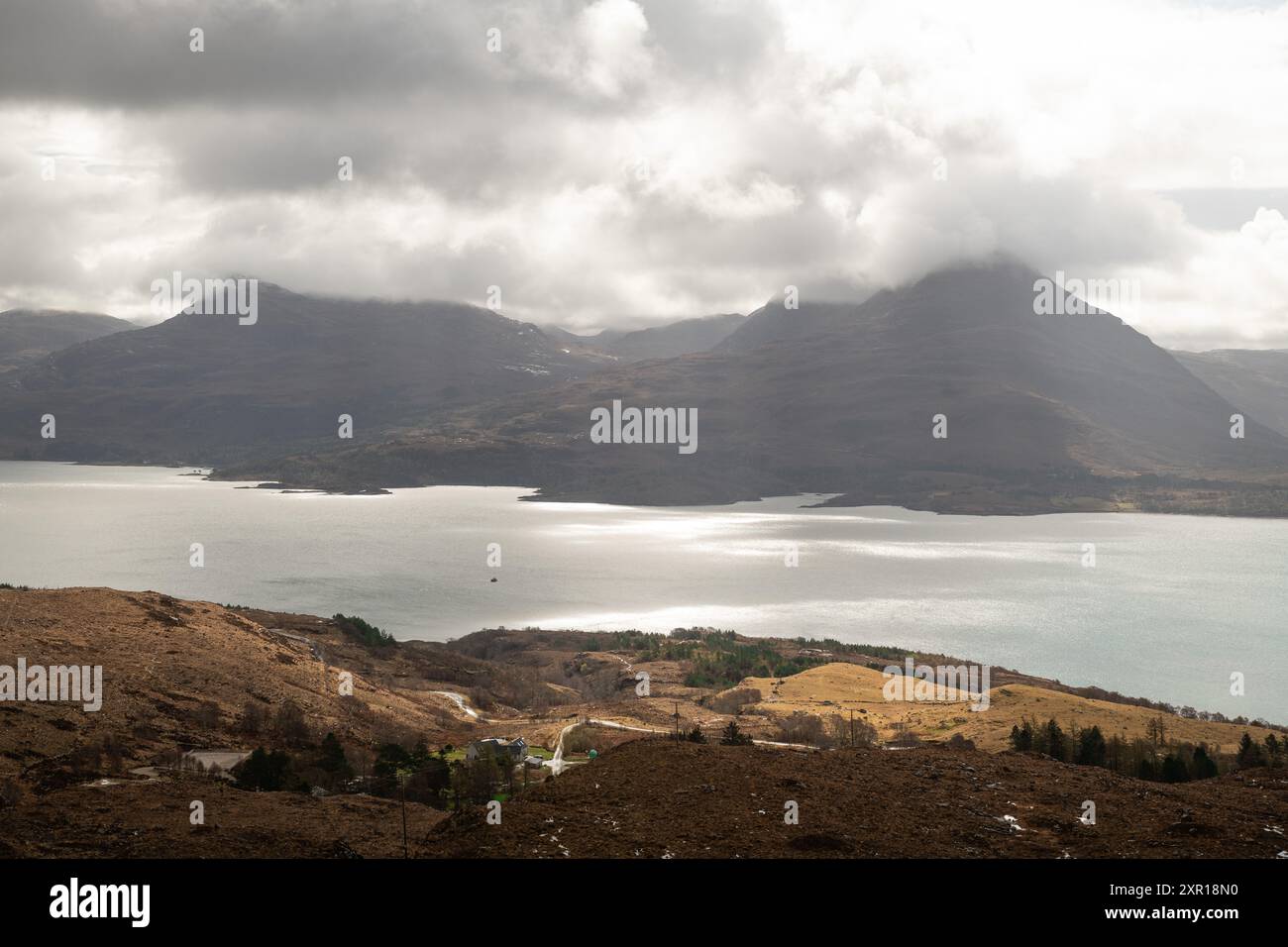 A scenic Scottish Highlands disappearing into misty mountains, with ...