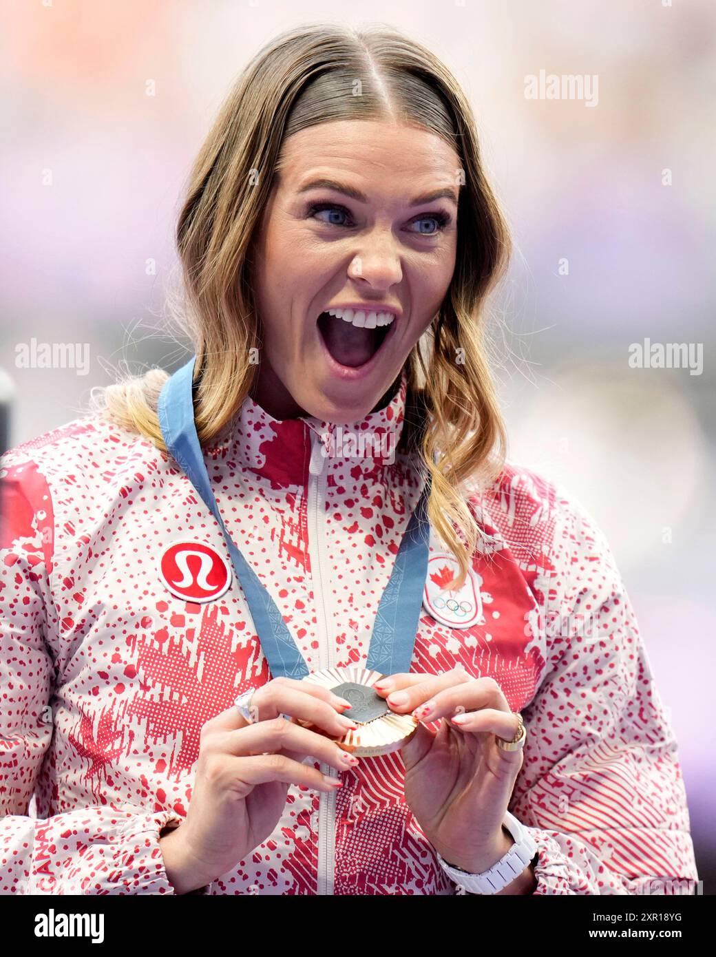 Women's pole-vault bronze medalist, Alysha Newman, of Canada, reacts as ...