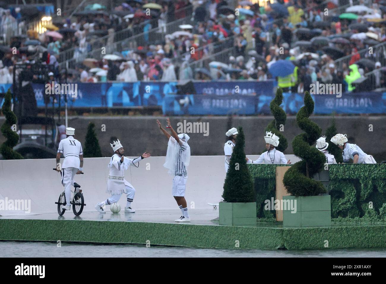People perform during the opening ceremony of the 2024 Summer Olympics ...