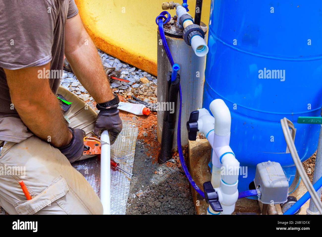 Water supply pipe made of PVC is being connected to pump house of an ...