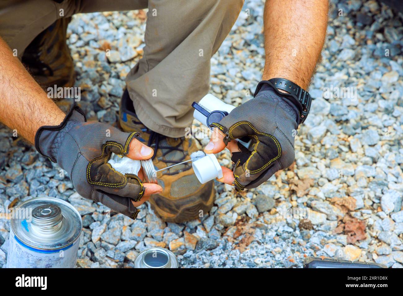 Gluing pvc pipe, plumber applies glue connected to water supply pipe of ...