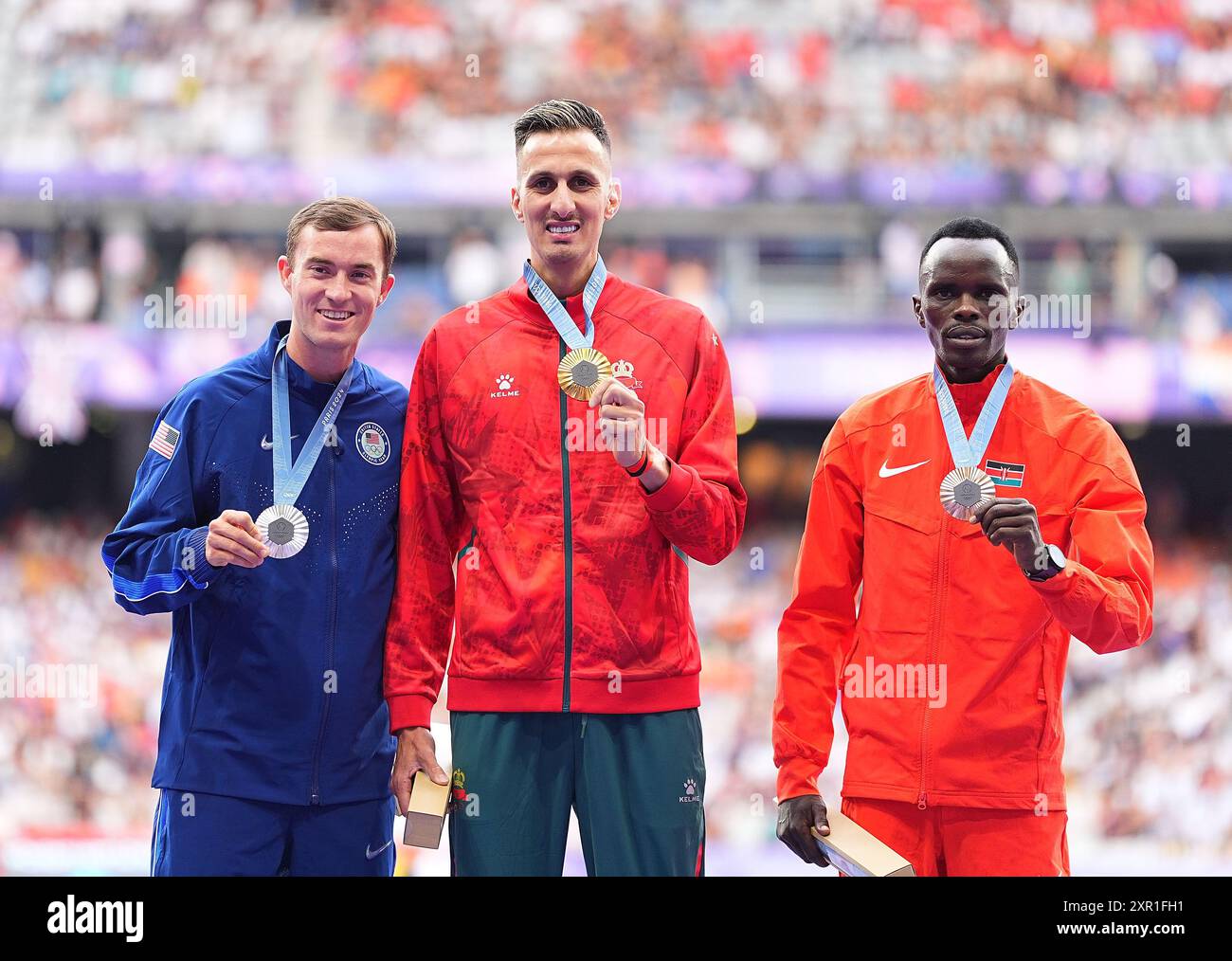 Paris, France. 8th Aug, 2024. Gold medalist Soufiane El Bakkali (C) of ...