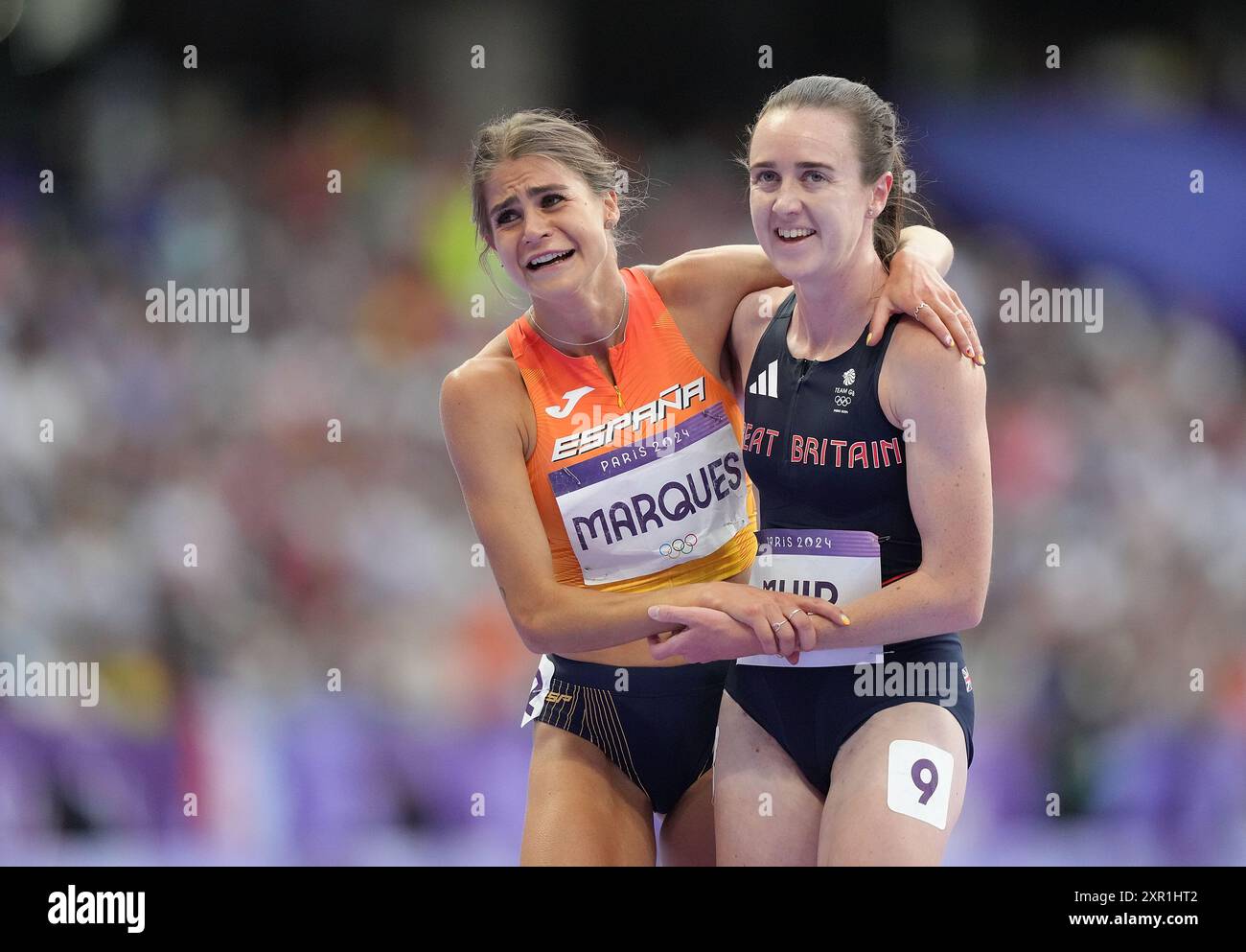 Paris, France. 8th Aug, 2024. Laura Muir (R) of Britain reacts with ...