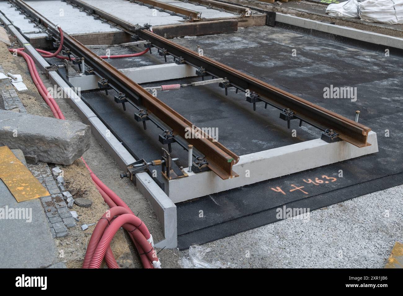 pneumatic pad at a construction site of tram tracks in a European city ...