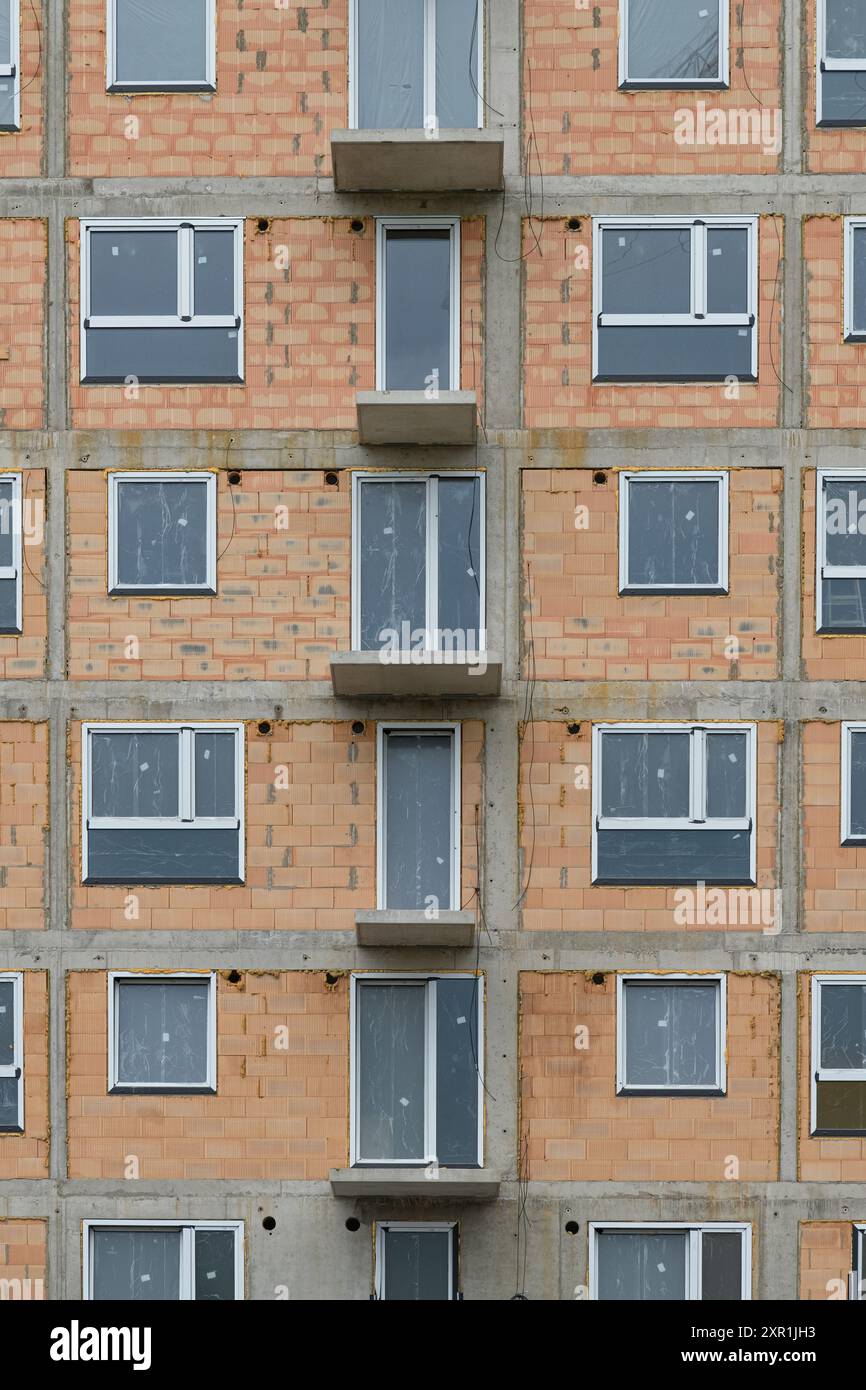 new building the real estate market. New construction building. red ...