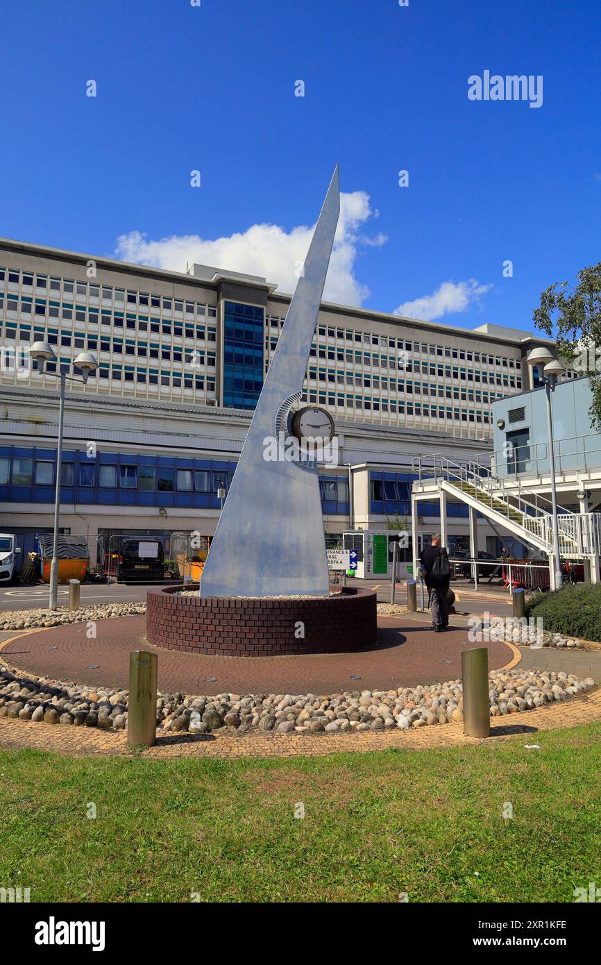 Modern design clock, reminiscent of a sundial. University Hospital of ...