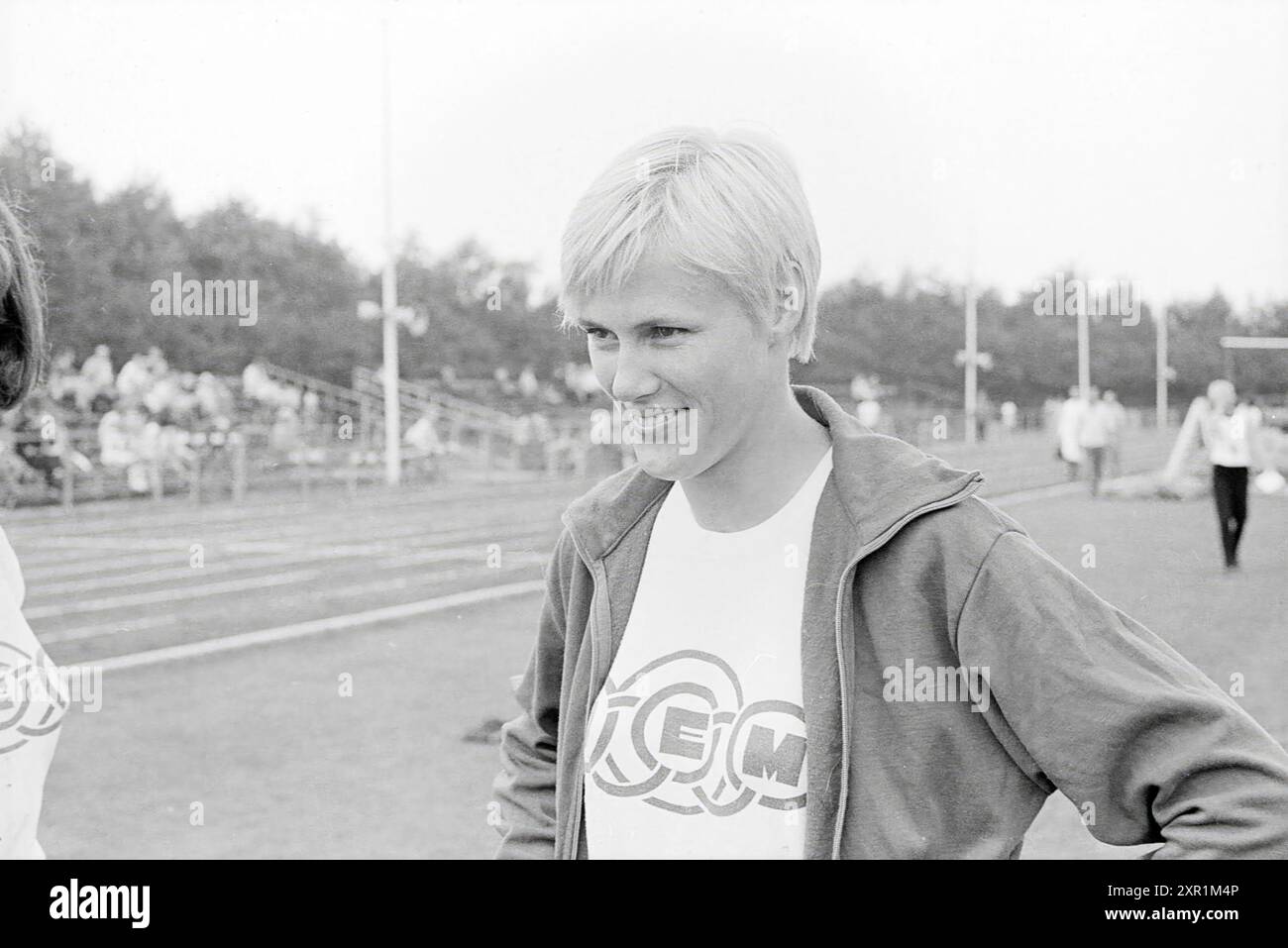 Athlete running cinder track, 00-00-1967 Stock Photo - Alamy