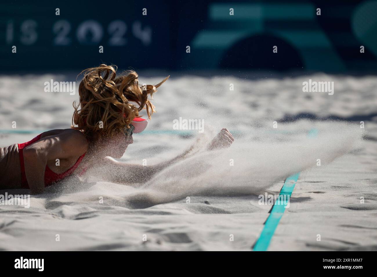Switzerland's Nina Brunner lands in the sand during the women's semi ...