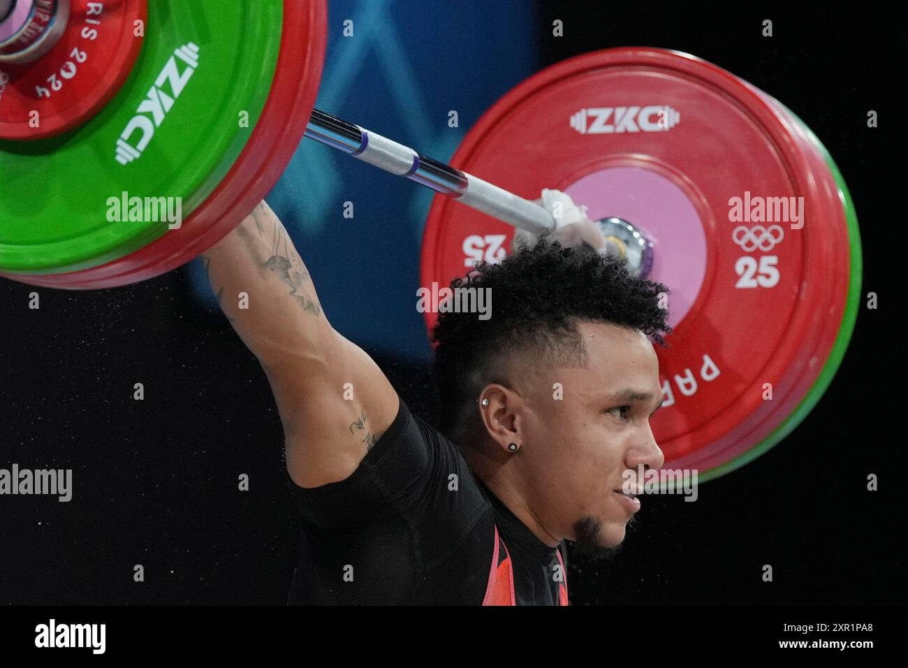 Luis Mosquera of Colombia competes during the men's 73kg weightlifting ...