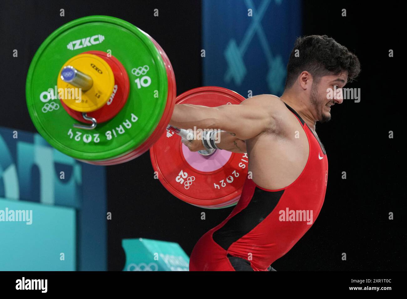 Muhammed Ozbek of Turkey fails to lift during the men's 73kg ...