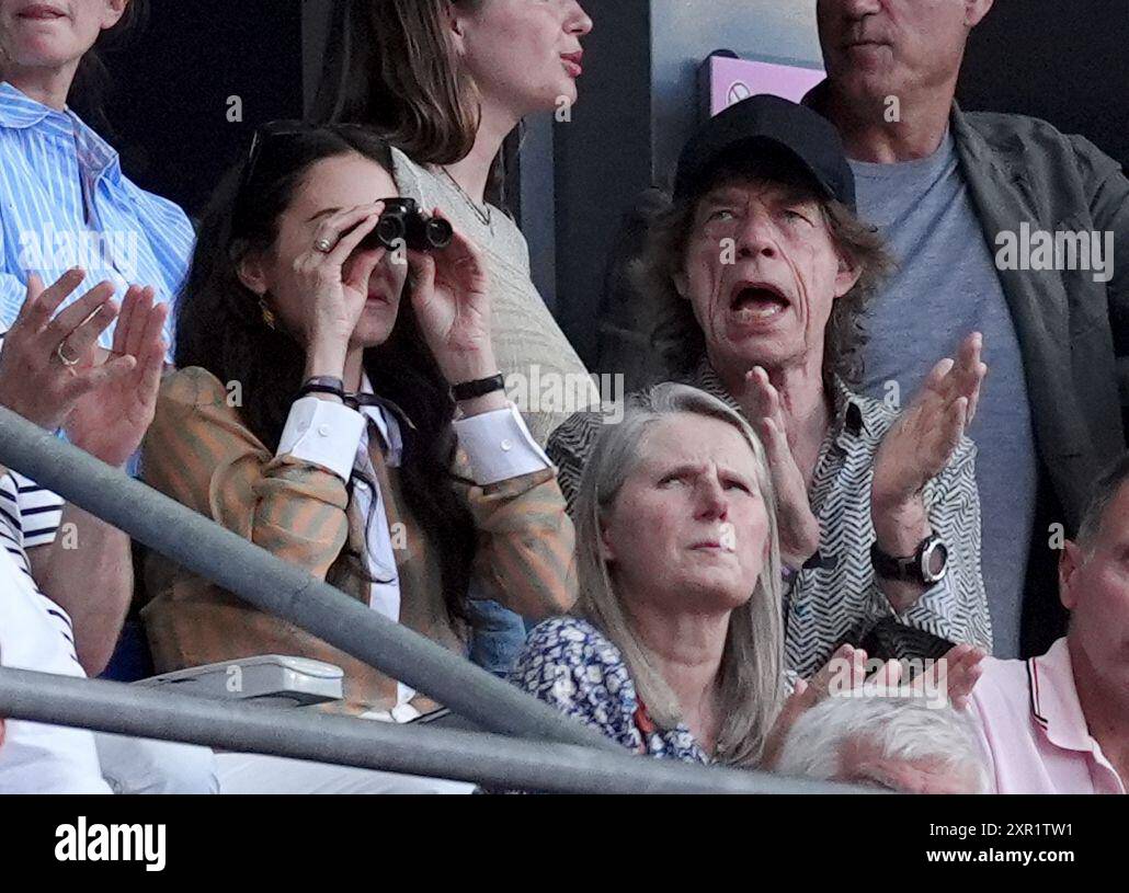 Mick Jagger and Melanie Hamrick in the stands at the Stade de France on ...
