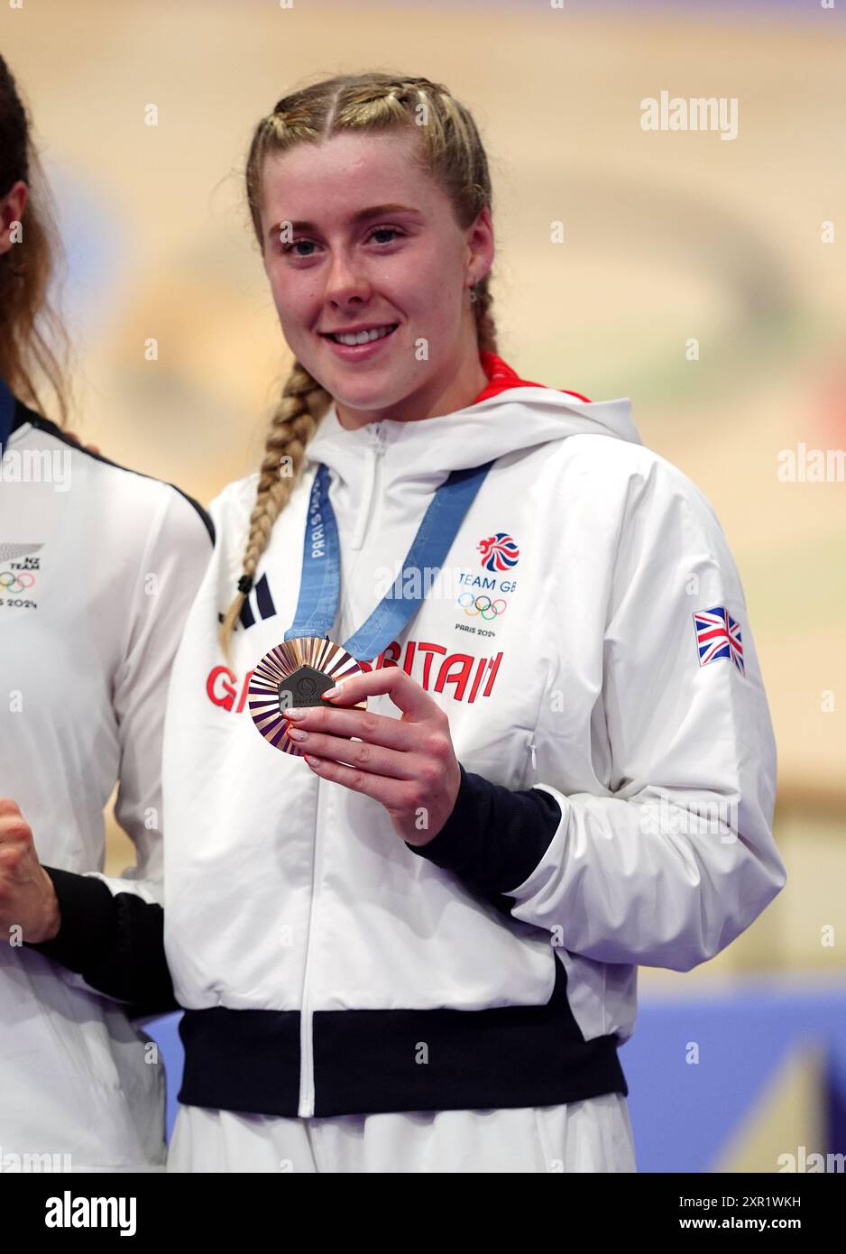 Great Britain's Emma Finucane receives her bronze medal during the ...
