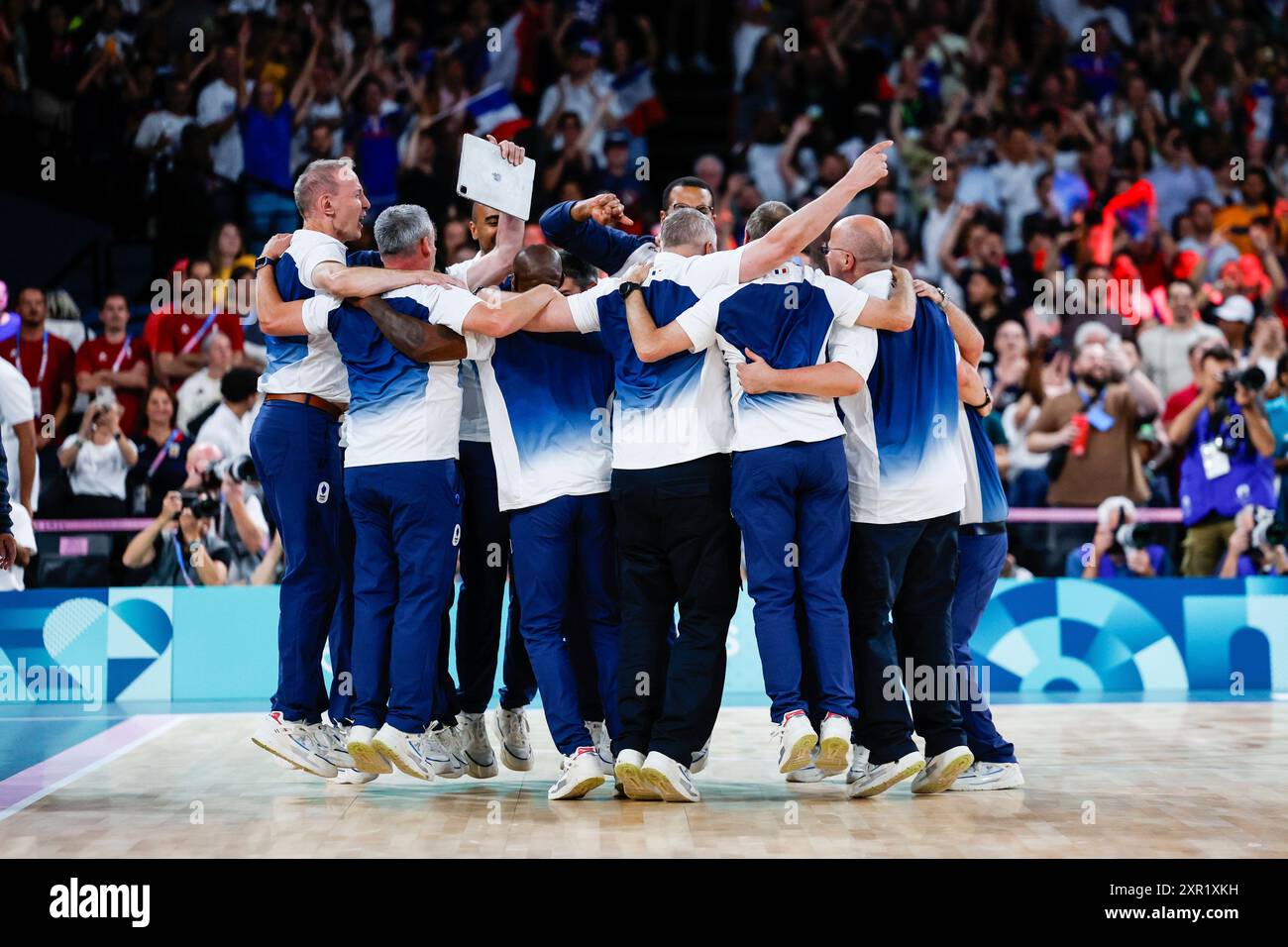 Coaches and staff of France celebrates after winning the Men's ...