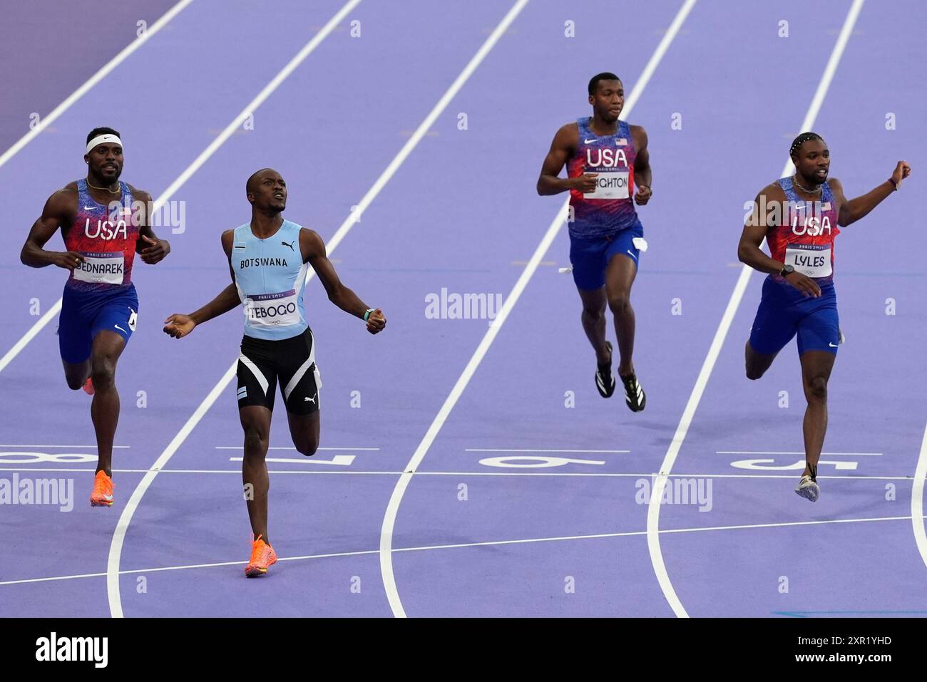 Letsile Tebogo, of Botswana, second left, wins the men's 200-meters ...