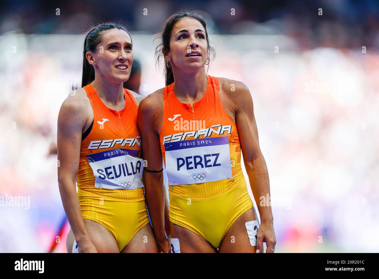 Team of Spain react during Women's 4 x 100m Relay Round 1 of the ...