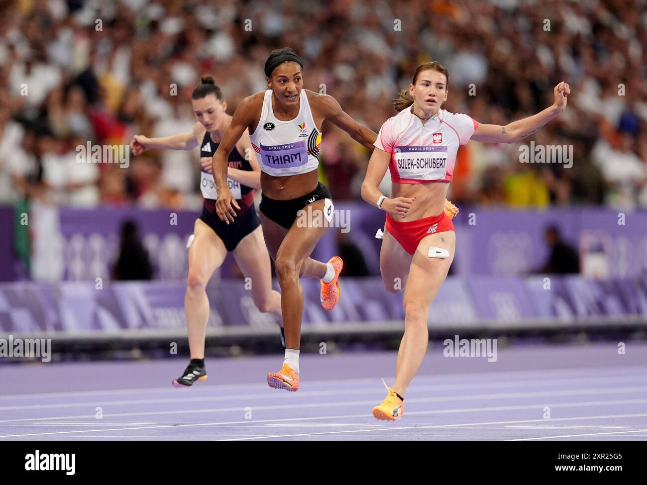 Belgium's Nafissatou Thiam finishing second in her heat of the Women's ...