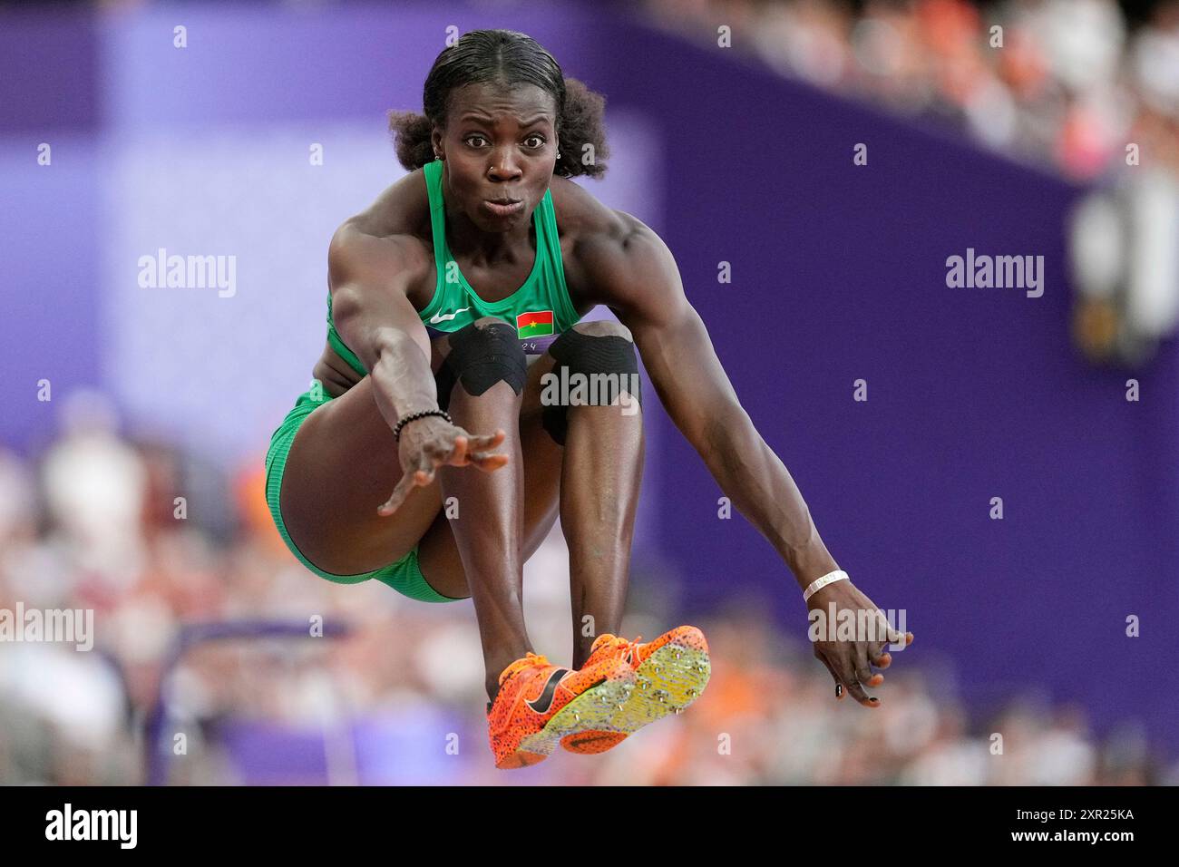 Marthe Koala, of Burkina Faso, competes during the women's long jump ...