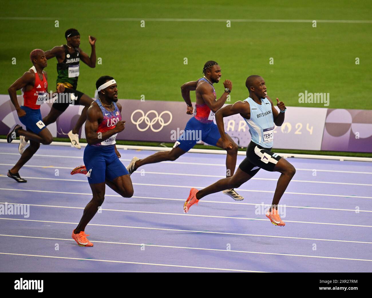 TEBOGO Letsile of Botswana (R) competes during the men's athletics 200m ...