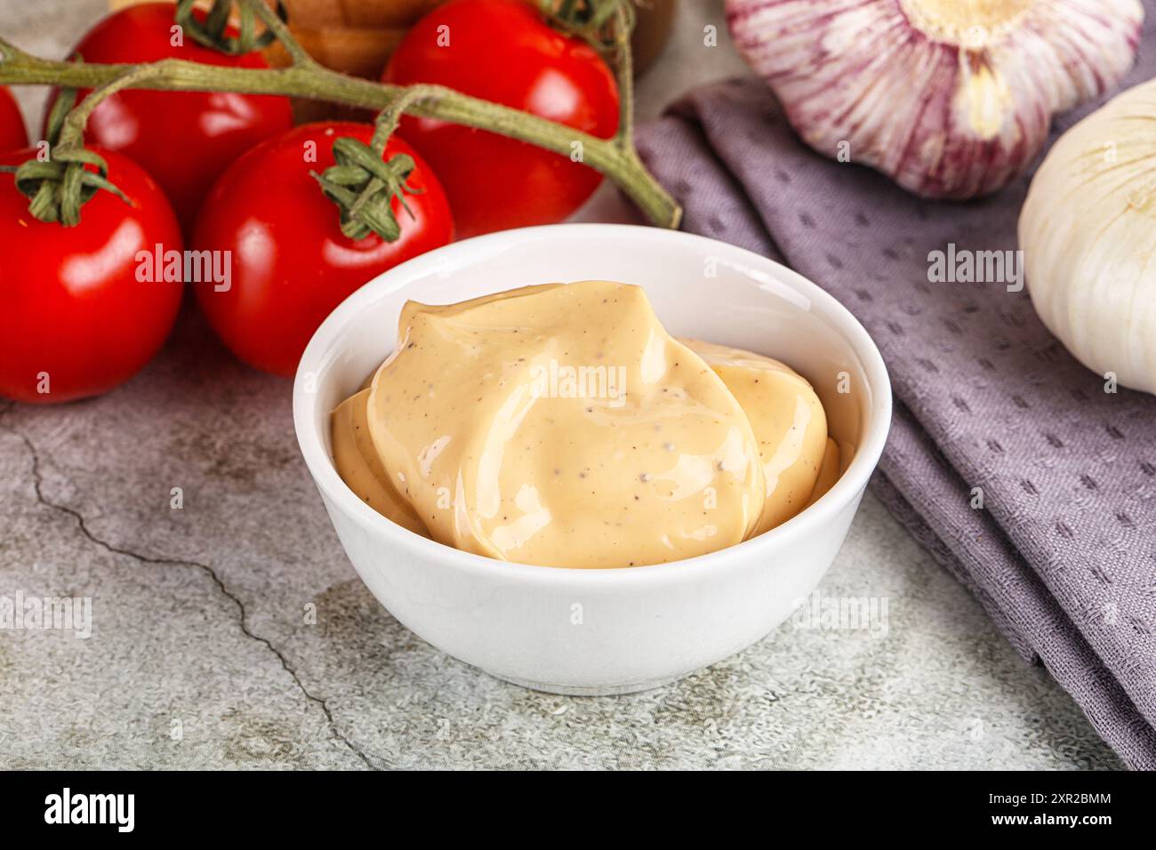 Bowl of Yellow cream grill sauce for burger Stock Photo - Alamy