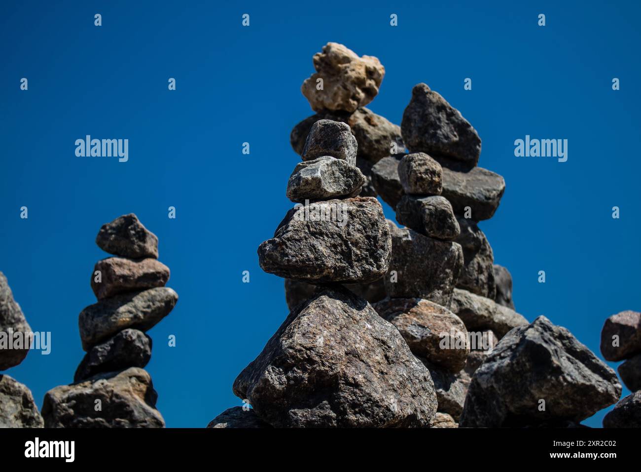 Odesa, Ukraine, August 08, 2024 Pile of stones built on Odesa beach ...