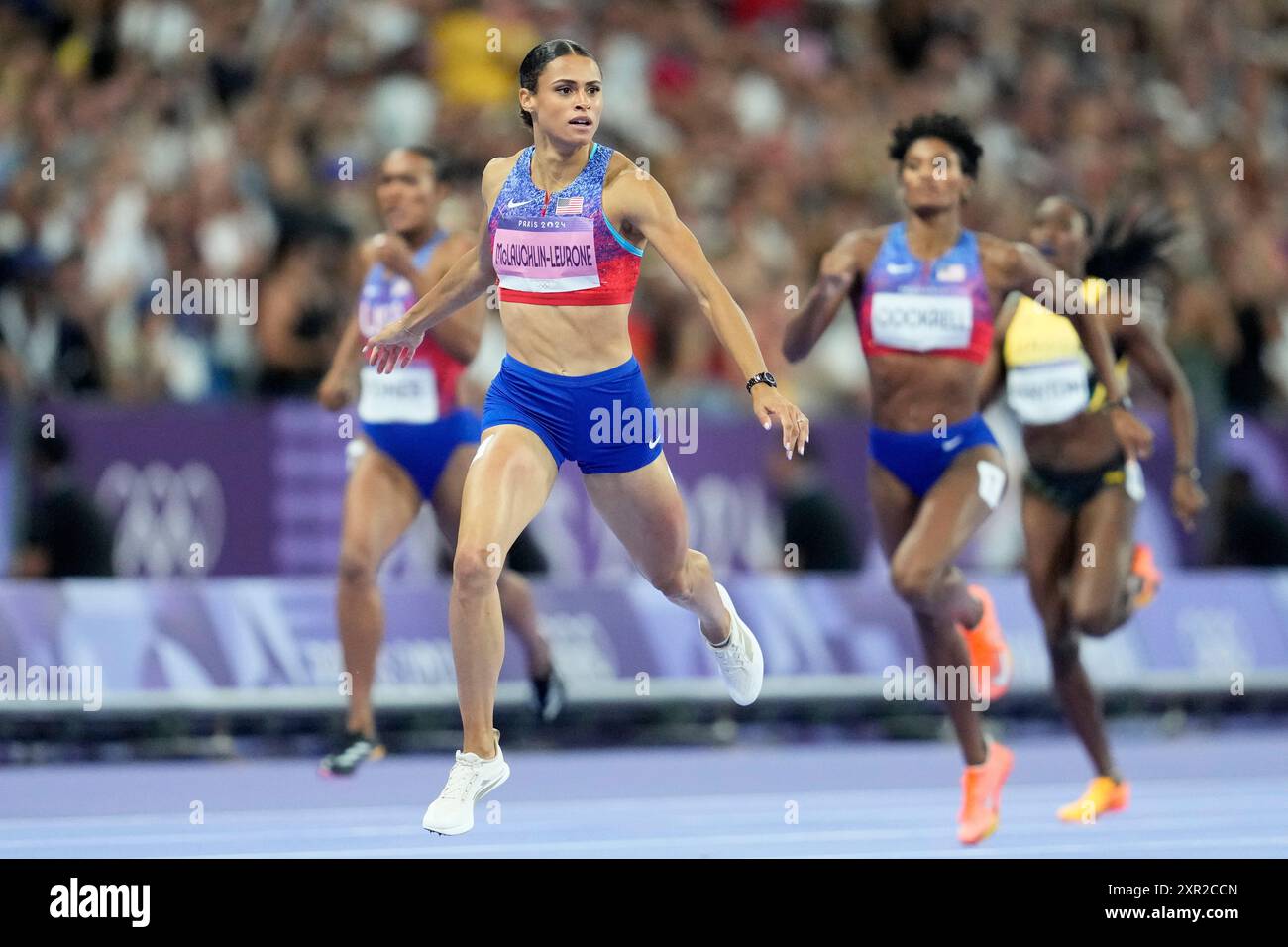 Sydney McLaughlin-Levrone, of the United States crosses the finish line ...