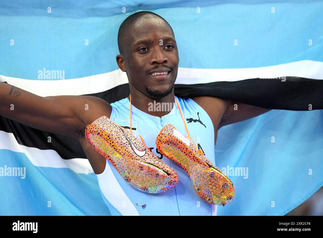 Letsile Tebogo, of Botswana, celebrates after winning the men's 200 ...