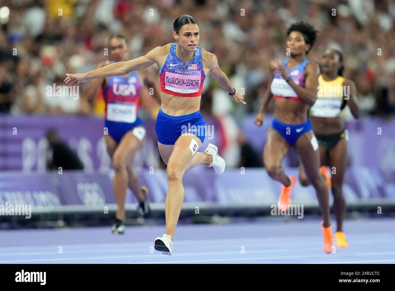 Sydney McLaughlin-Levrone, of the United States crosses the finish line ...
