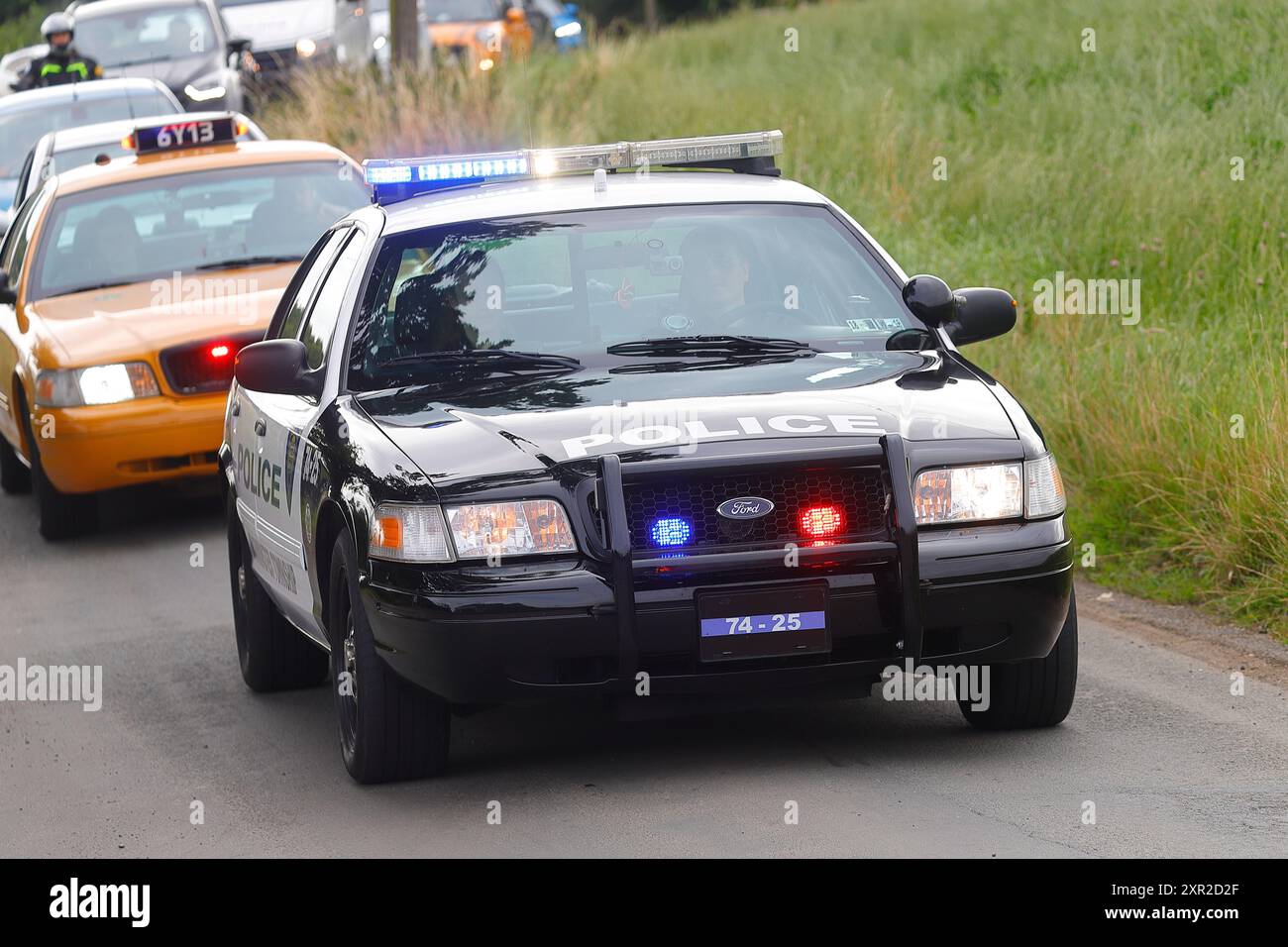 A United States Police car seen arriving at the Cops & Cars Show at The ...
