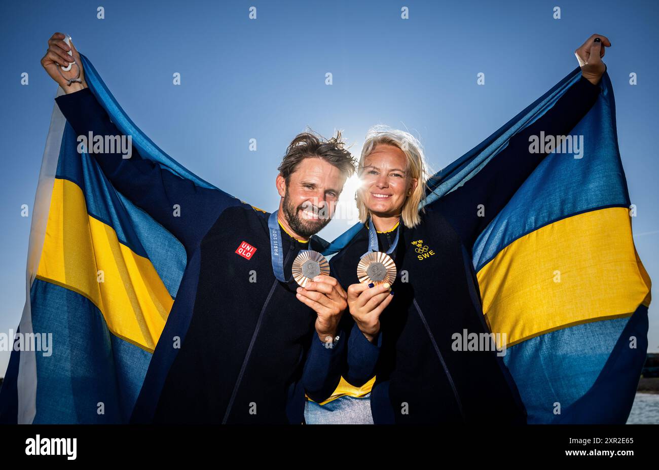 Anton Dahlberg and Lovisa Karlsson of, Sweden. , . pose with their bronze medals after the medal ...