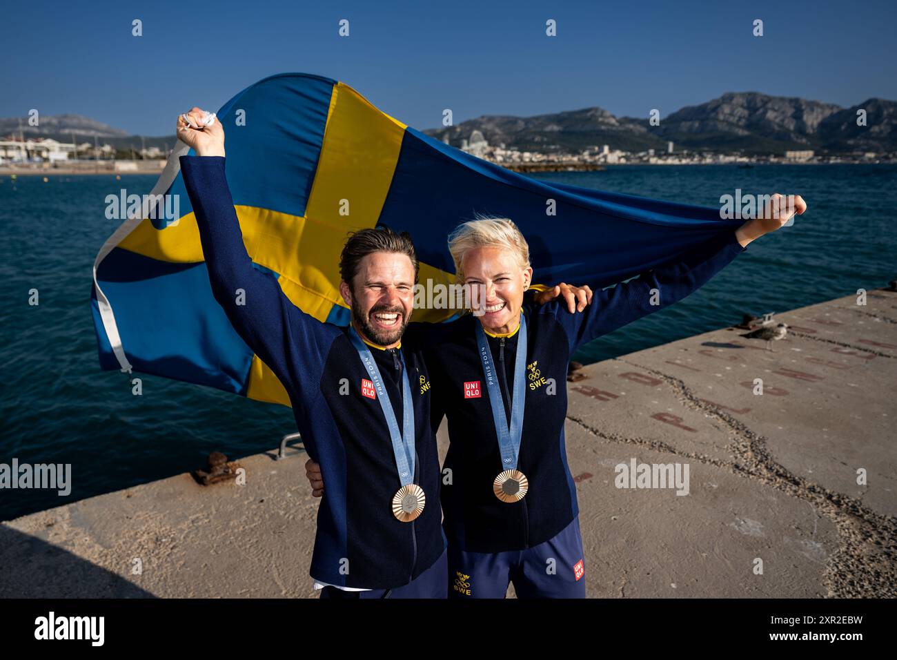 Anton Dahlberg and Lovisa Karlsson of, Sweden. , . pose with their bronze medals after the medal ...