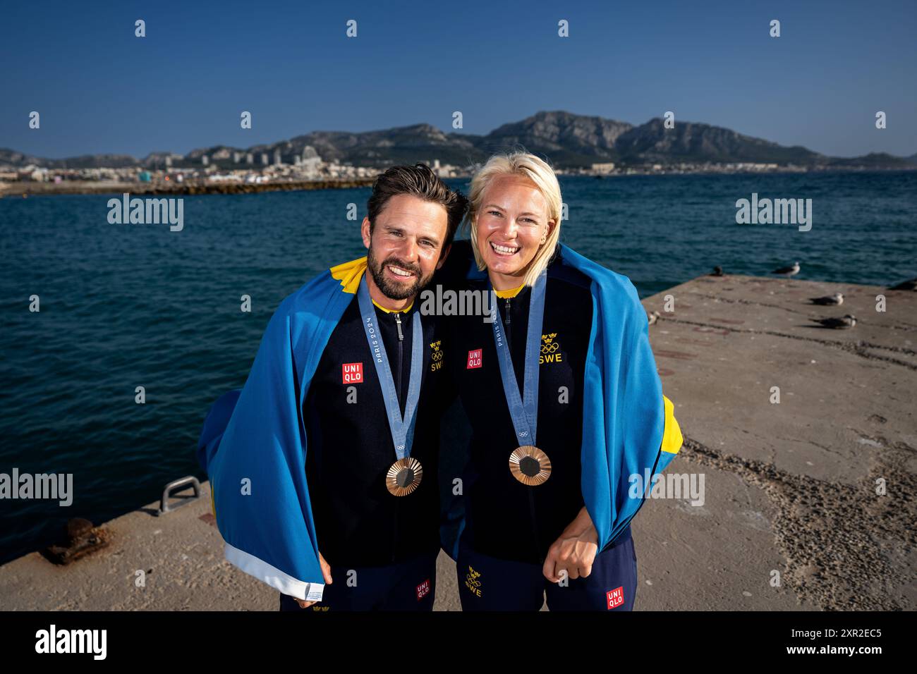 Anton Dahlberg and Lovisa Karlsson of, Sweden. , . pose with their bronze medals after the medal ...
