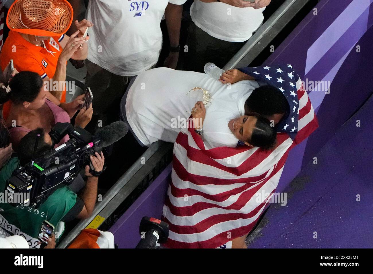 Sydney McLaughlin-Levrone gets a hug from her husband, Andre Levrone Jr ...