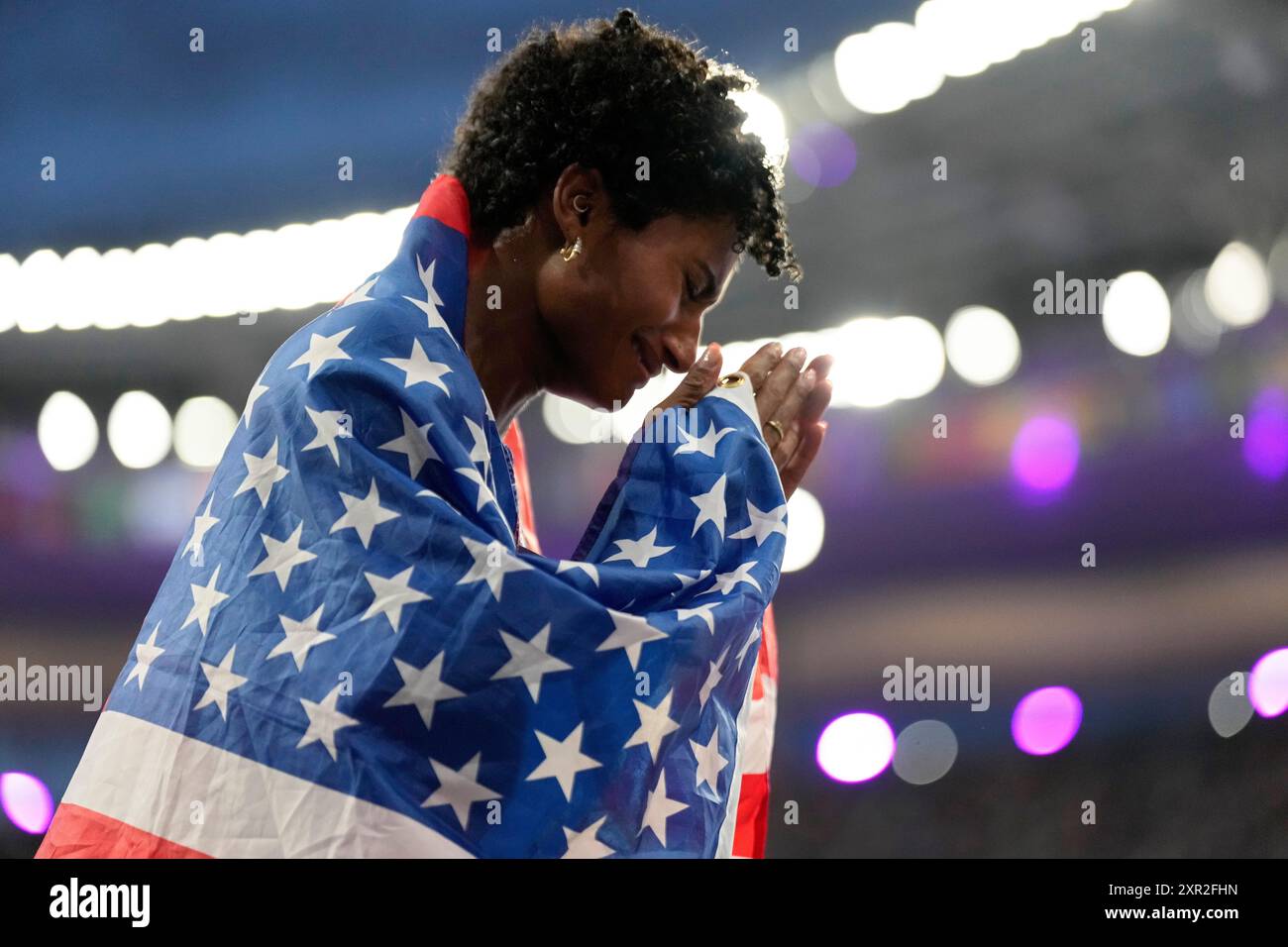 Anna Cockrell, of the United States, reacts after winning the silver ...