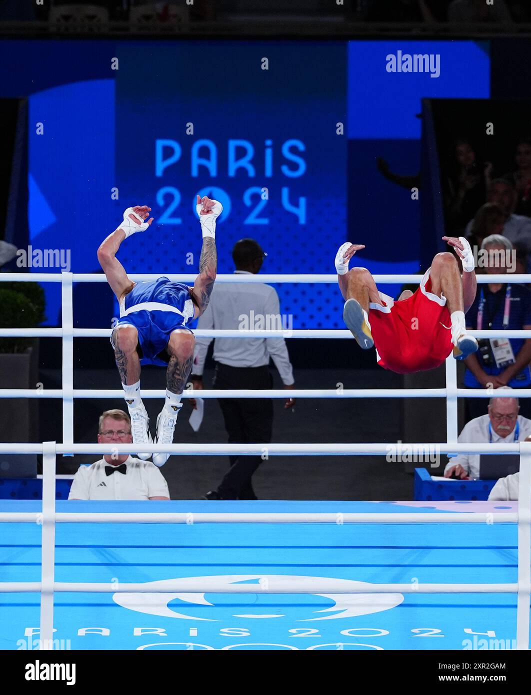 Australia’s Charlie Senior (left) and Uzbekistan’s Abdumalik Khalokov ...