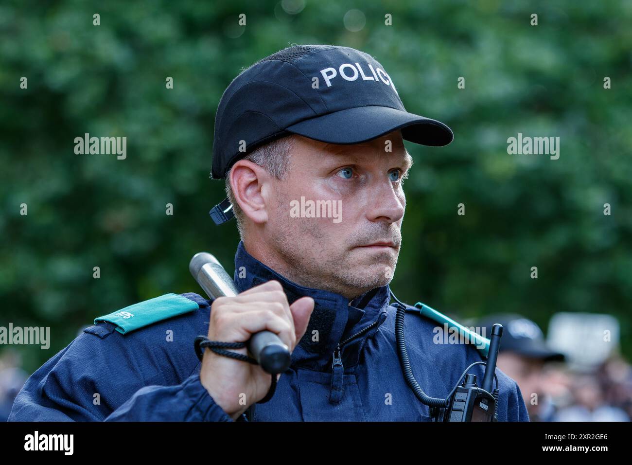 Uk riot police officer holding baton hi-res stock photography and ...