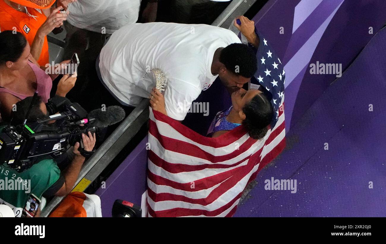 Sydney McLaughlin-Levrone gets a kiss from her husband, Andre Levrone ...