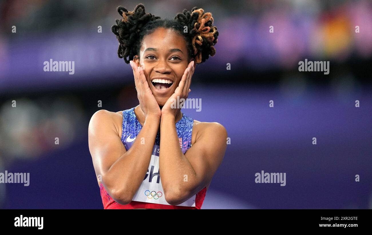Monae' Nichols, of the United States, reacts during the women's long ...