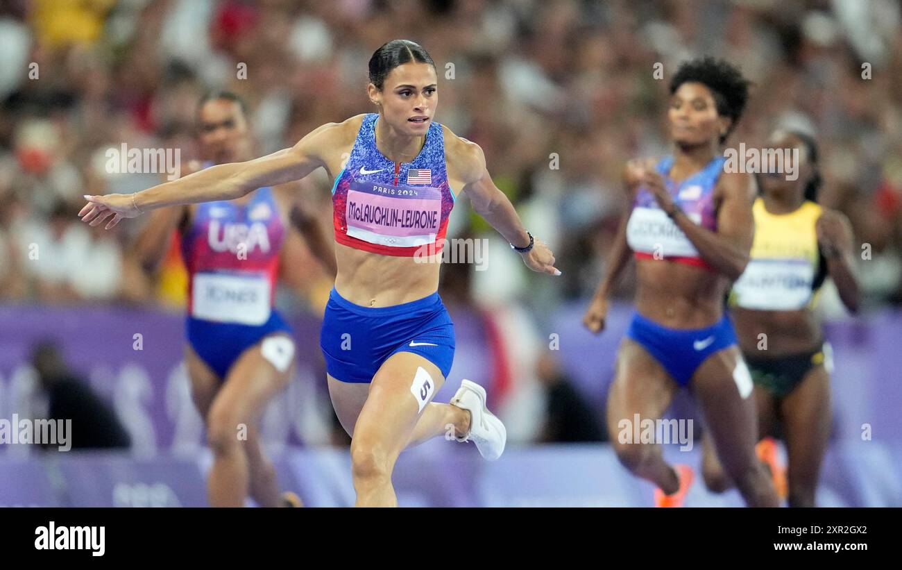 Sydney McLaughlin-Levrone, of the United States crosses the finish line ...